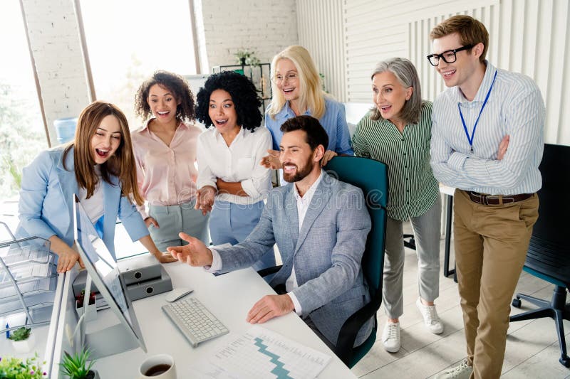 Group of Diverse Professional Colleagues Collaborating in a Modern ...