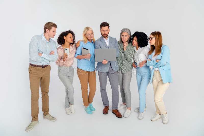 Diverse Group of Professionals Collaborating in Formal Attire, Sharing ...