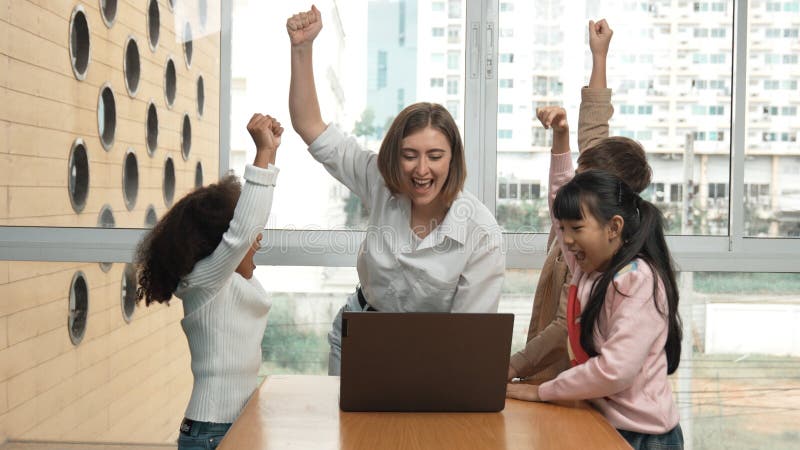 A Group of Diverse Student and Teacher Celebrate Successful Project ...