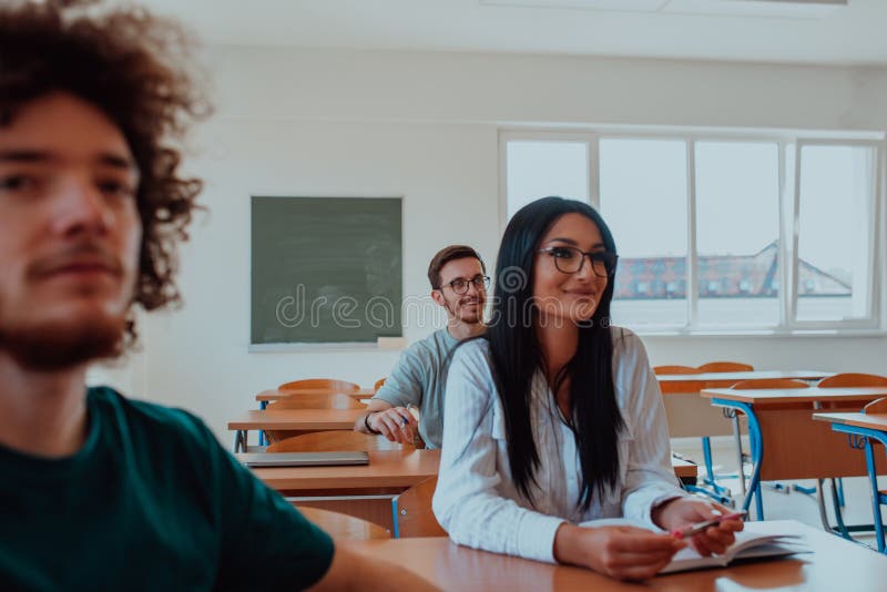 A Group of Diverse Students Engages in Lively Discussion As they ...