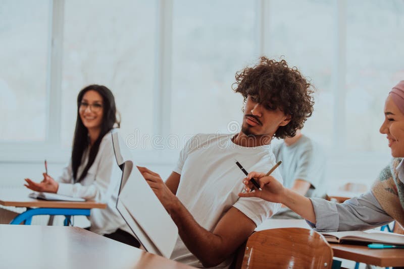 A Group of Diverse Students Engages in Lively Discussion As they ...