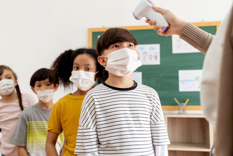 Group of Diverse Students in School Building Checked and Scanned for ...