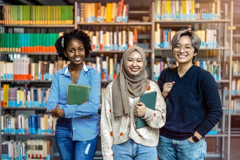 Group of Diverse Students Standing Together in a Library Stock Photo ...