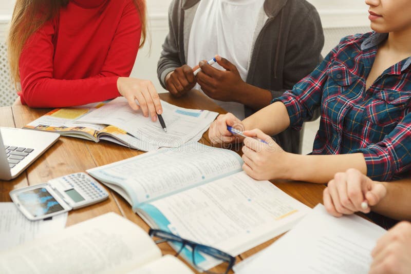 Group of Diverse Students Studying at Wooden Table Stock Photo - Image ...