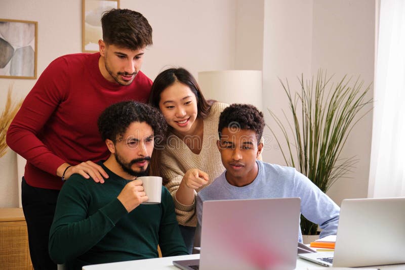 Group of Diverse University Colleagues Studying Together at Shared Flat ...