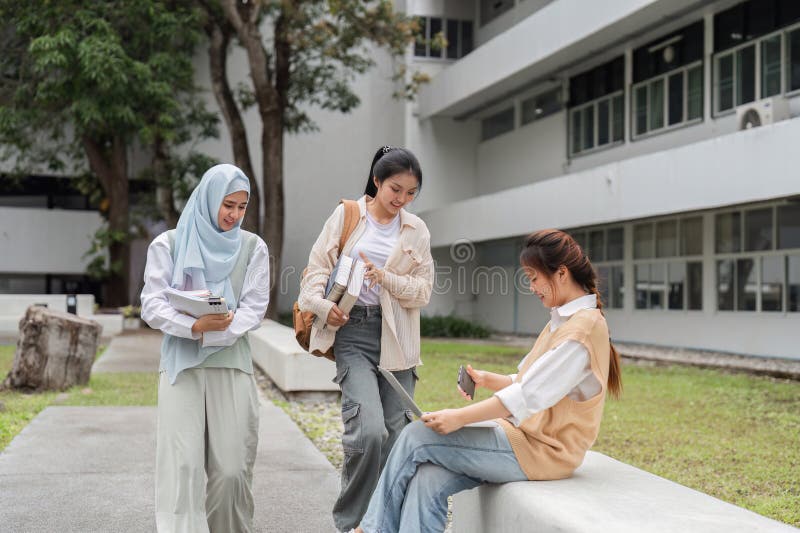 Diverse University Students Collaborating Outdoors, Sharing Ideas and ...