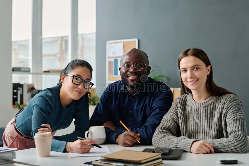 Group of Cheerful Diverse Young Managers at Work Stock Image - Image of finance, team: 313185607