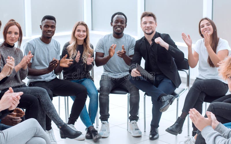Group of Diverse Young People Applauding at a Meeting. Stock Photo ... Group of Diverse Young People Applauding at a Meeting. Stock Photo ...