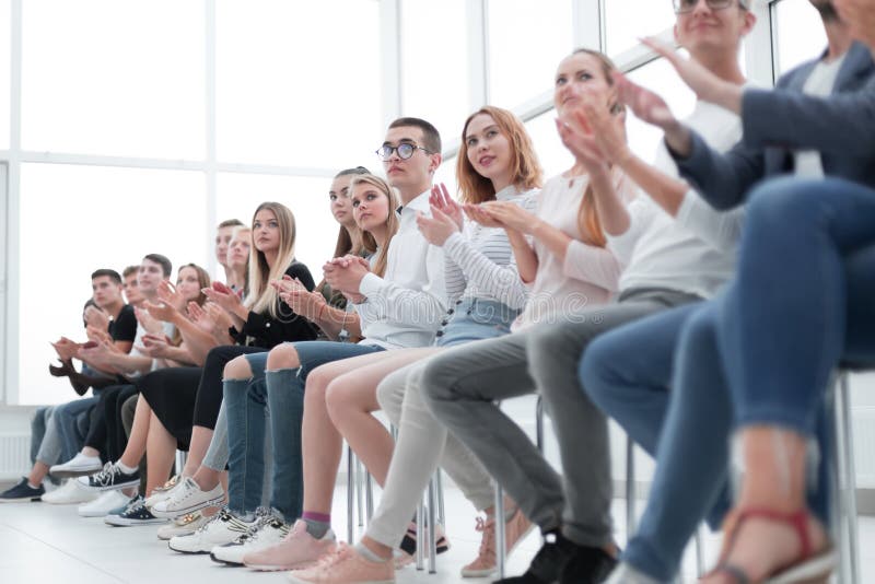 Group of Diverse Young People Sitting in a Row Stock Image - Image of ...