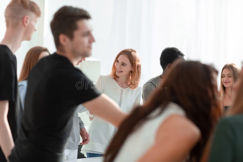 Group of Diverse Young People Standing Around a Round Table Stock Image ...