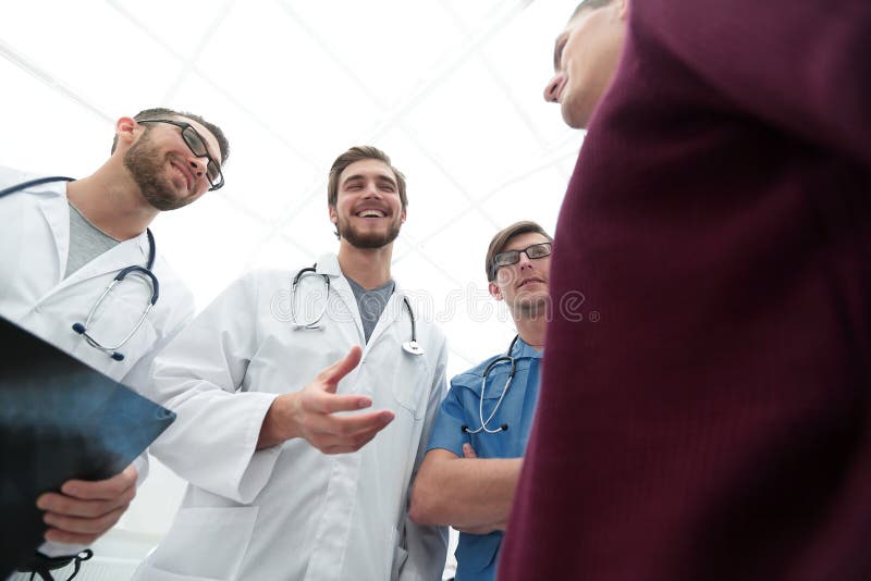 Group of Doctors Advising the Patient Stock Photo - Image of medicine ...