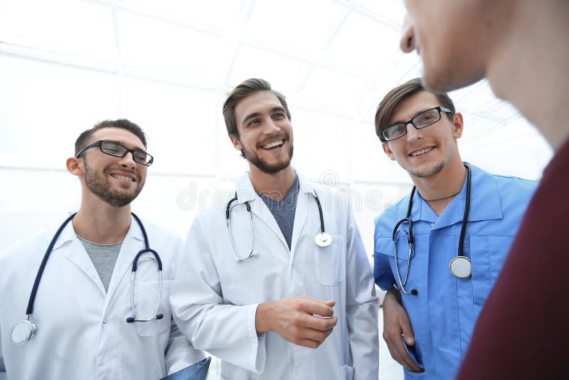 Group of Doctors Advising the Patient Stock Image - Image of asking ...