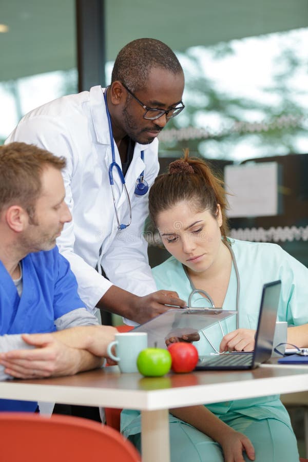 Group Doctors in Cafeteria Relaxing Stock Photo - Image of profession ...