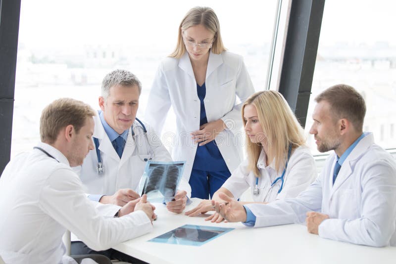 Group of Doctors Discuss X-ray Stock Photo - Image of office, bone ...
