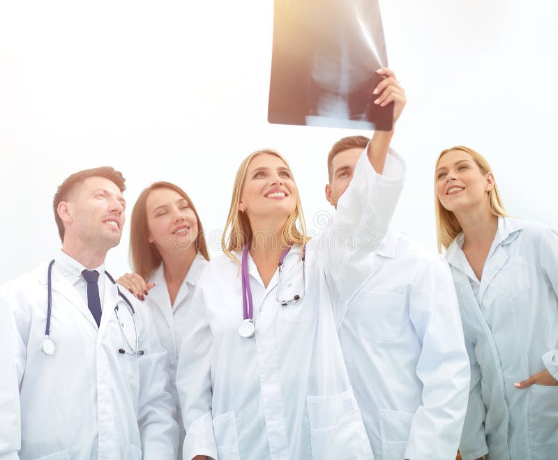 Group of Doctors Discussing an X-ray Stock Image - Image of friendly ...