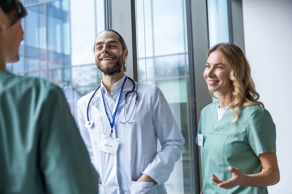 Group of Doctors Discussing Something and Looking Excited and Interested Stock Image - Image of ...
