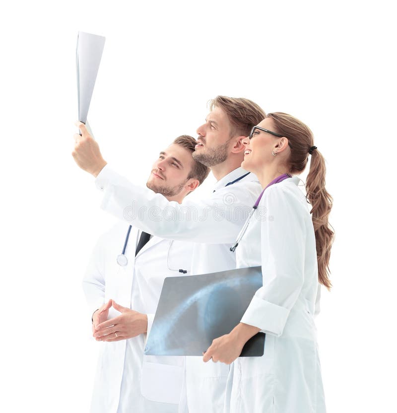A Group of Doctors Examining an X-ray in the Hospital Stock Photo ...