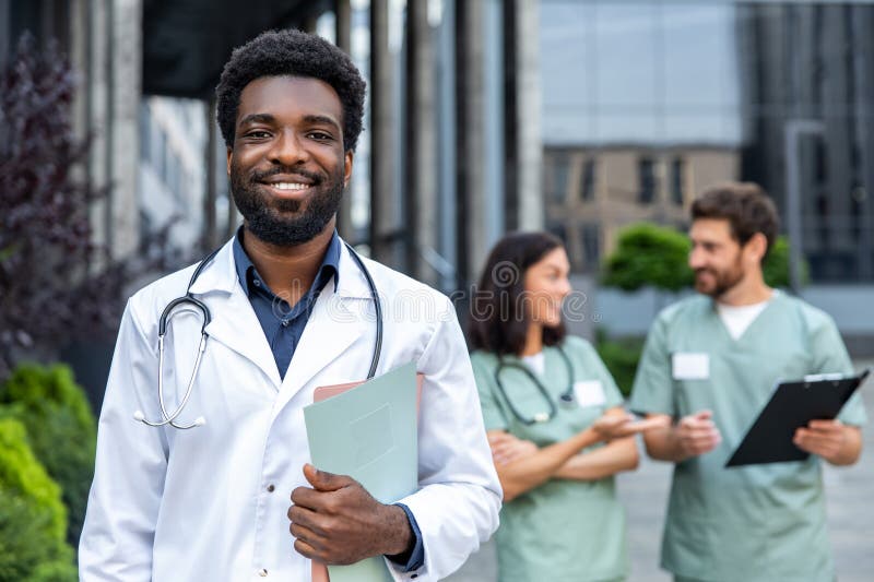 Group of Doctors in Lab Coats Looking Positive and Contented Stock ...