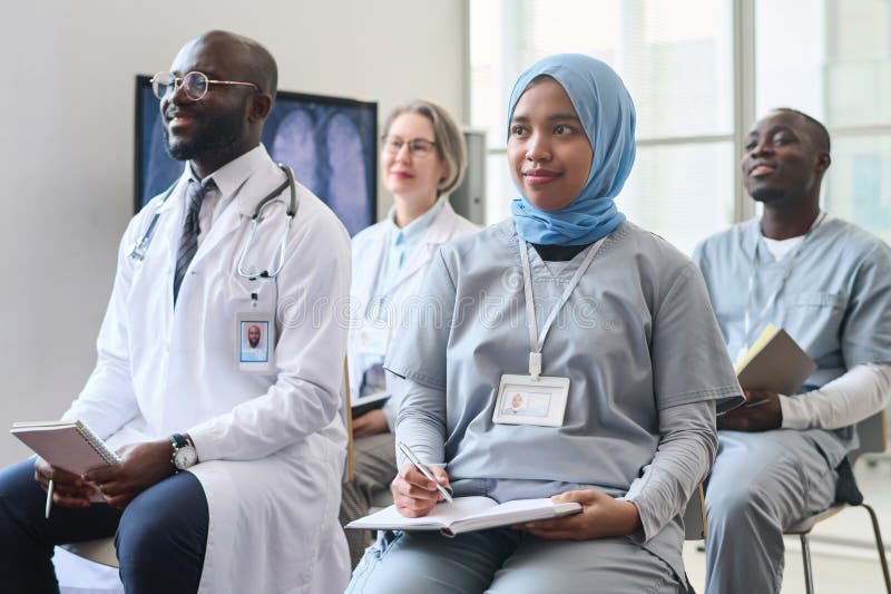Group of Doctors Sitting at Conference Stock Photo - Image of medicine ...