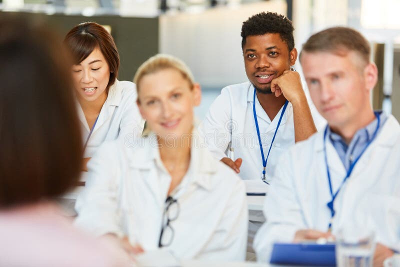 Doctors at a Training Hear a Presentation Stock Photo - Image of clinic ...