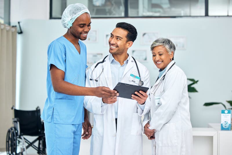 Group, Doctors and Nurse with a Tablet, Teamwork and Connection with ...