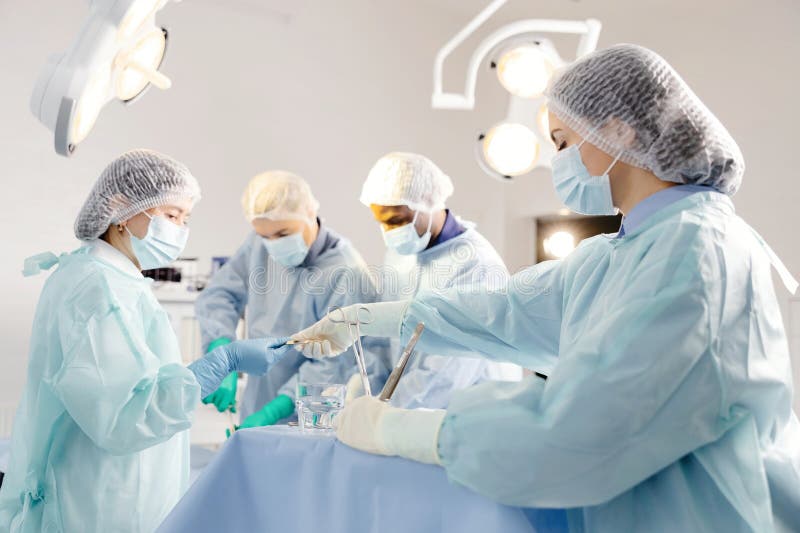 Group of Doctors Performing Surgery in Hospital Stock Image - Image of ...