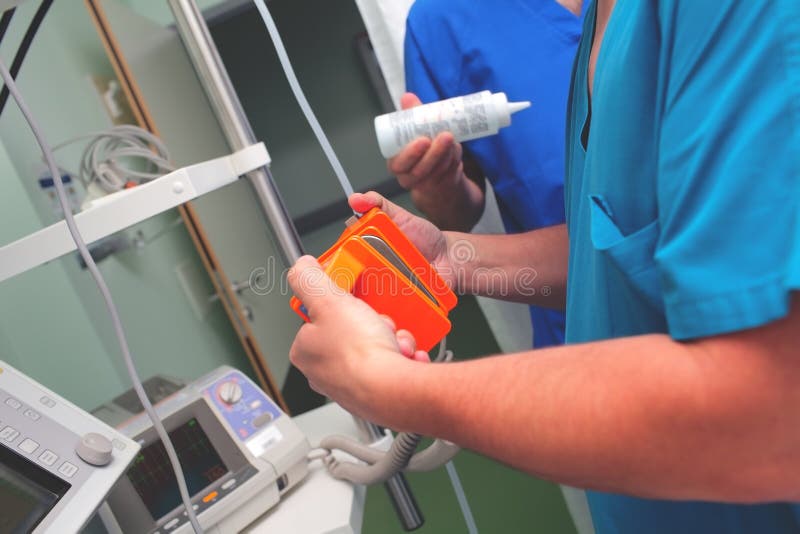 Group of Doctors Ready To the Countershock Stock Photo - Image of ...