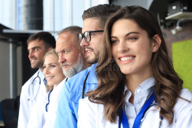 Group of Doctors Standing at the Medical Office Stock Image - Image of ...