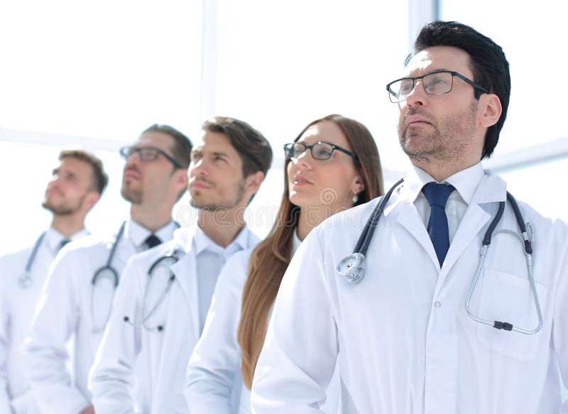 Group of Doctors Standing in a Row and Looking at a Copy Space Stock ...