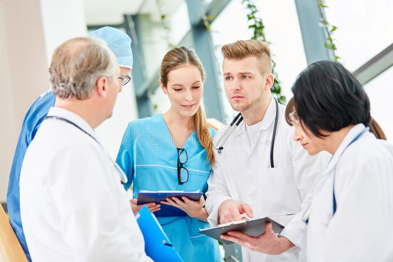 Group of Doctors in Teamwork Stock Photo - Image of group, profession ...