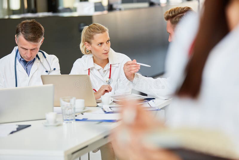 Group of Doctors in Training in a Meeting Stock Image - Image of ...