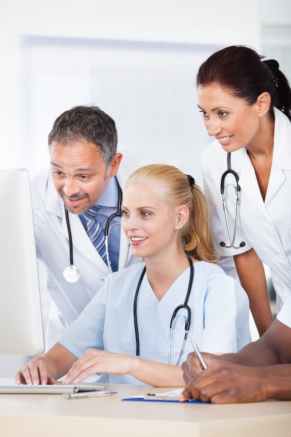 Doctor Showing the Screen of a Computer To a Colleague Stock Photo ...