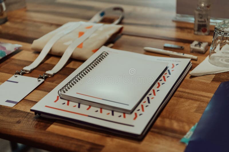 A Group of Documents and a Schedule on the Table Prepared for the ...