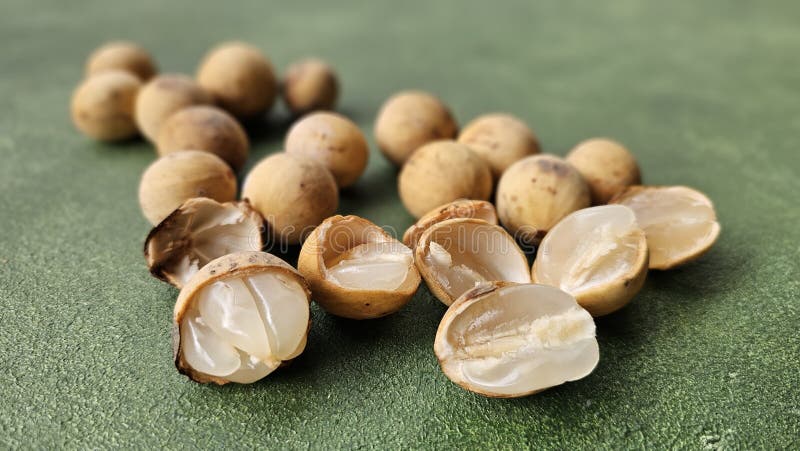 Group Dukuh Fruit Some Peeled Green Background Stock Photos - Free ...