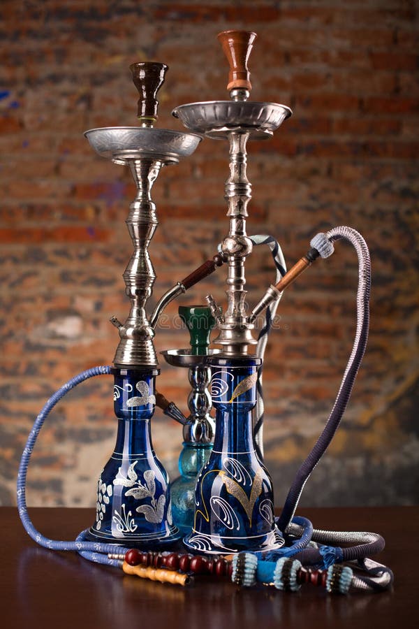 Group of Eastern Hookahs on Table Stock Image - Image of arabia ...