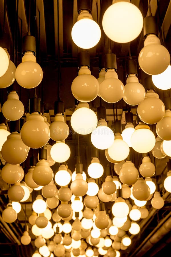 Group of Edison Light Bulbs Hanged from Ceiling in Department St Stock ...