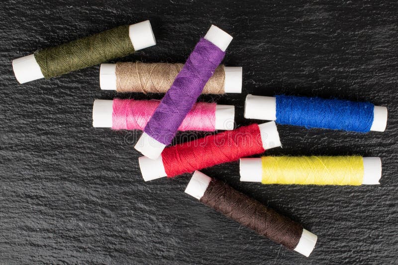 Sewing Thread Spool on Grey Stone Stock Image - Image of pink ...