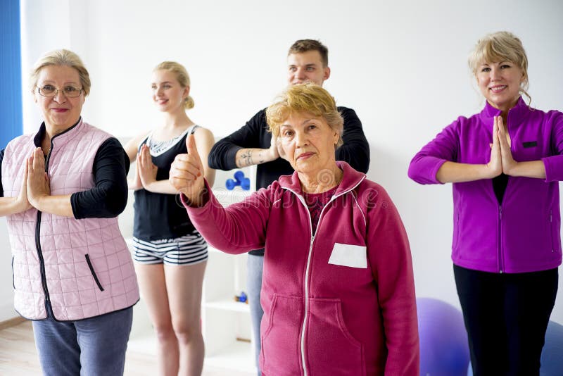 Group of Elderly People Doing Exercises Stock Image - Image of health ...
