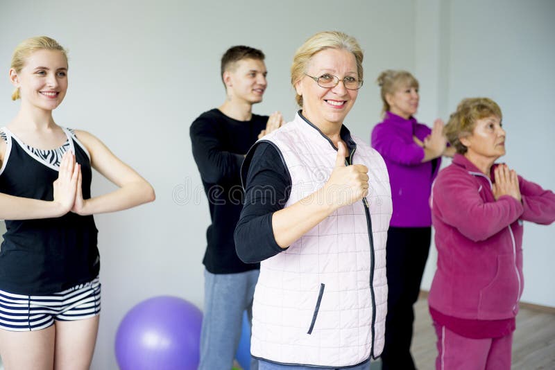 Group of Elderly People Doing Exercises Stock Photo - Image of health ...