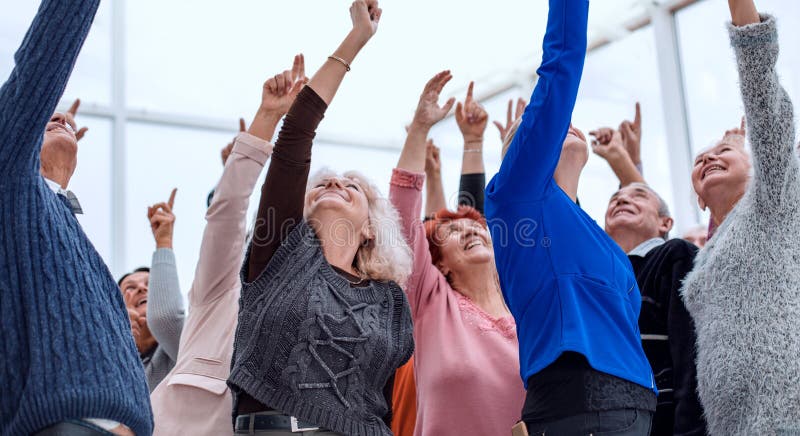 A Group of Elderly People are Reaching Up Stock Photo - Image of look ...