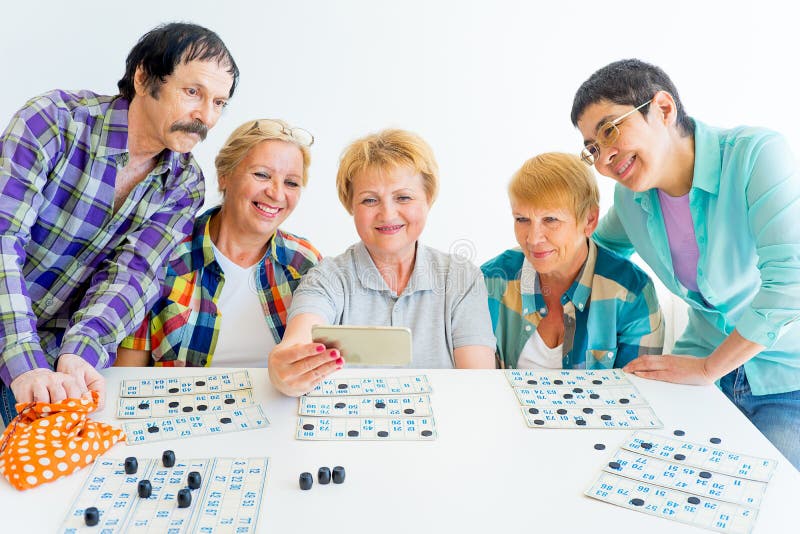 Seniors playing bingo stock image. Image of game, citizen - 102171803