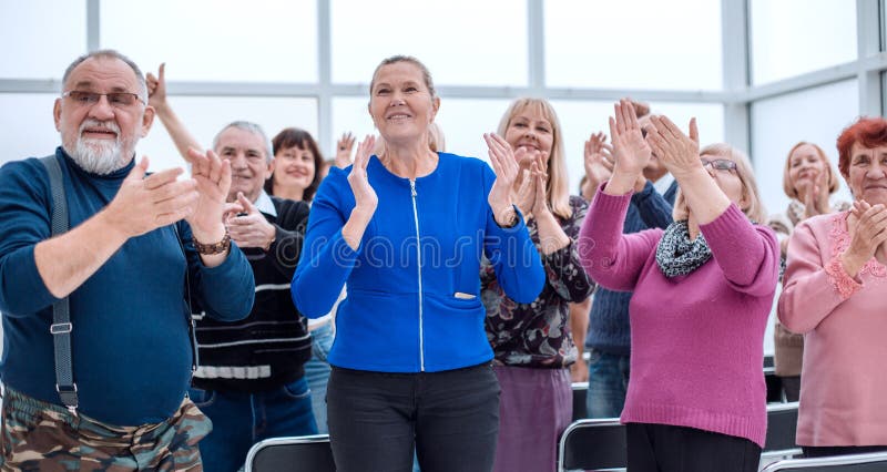 A Group of Elderly People are Sitting in a Circle Clapping Their Stock ...
