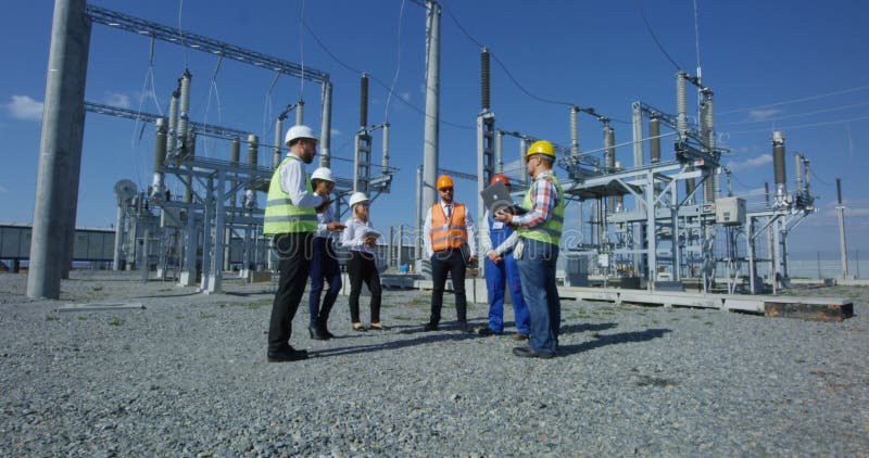 A Group of Electrical Workers Stock Video - Video of power, equipment ...