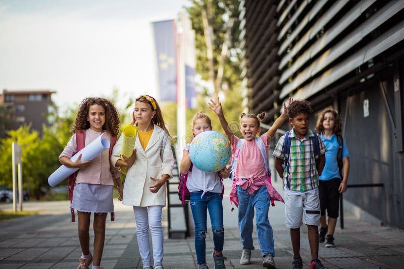 Group of Elementary Age Schoolchildren Outside. Happy School Kids Stock ...