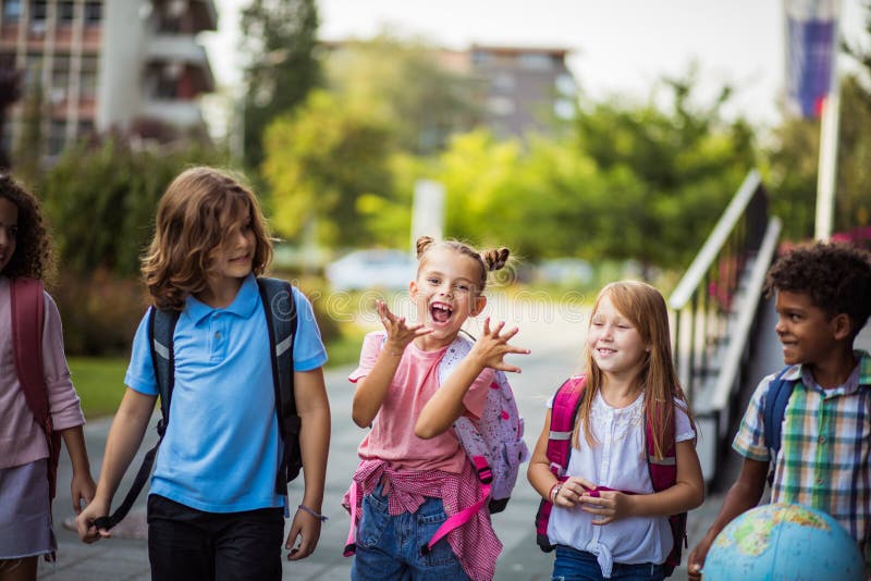 Group of Elementary Age Schoolchildren Outside Stock Image - Image of ...