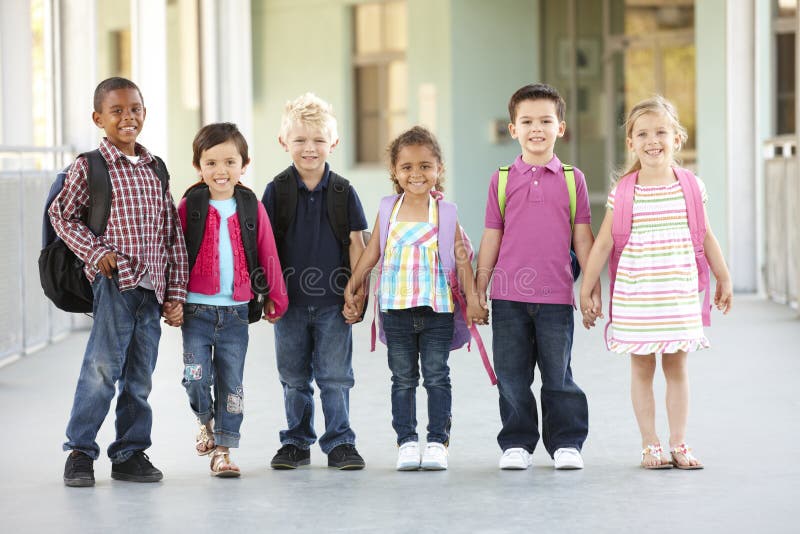 Group of Elementary Age Schoolchildren Standing Outside Stock Image ...