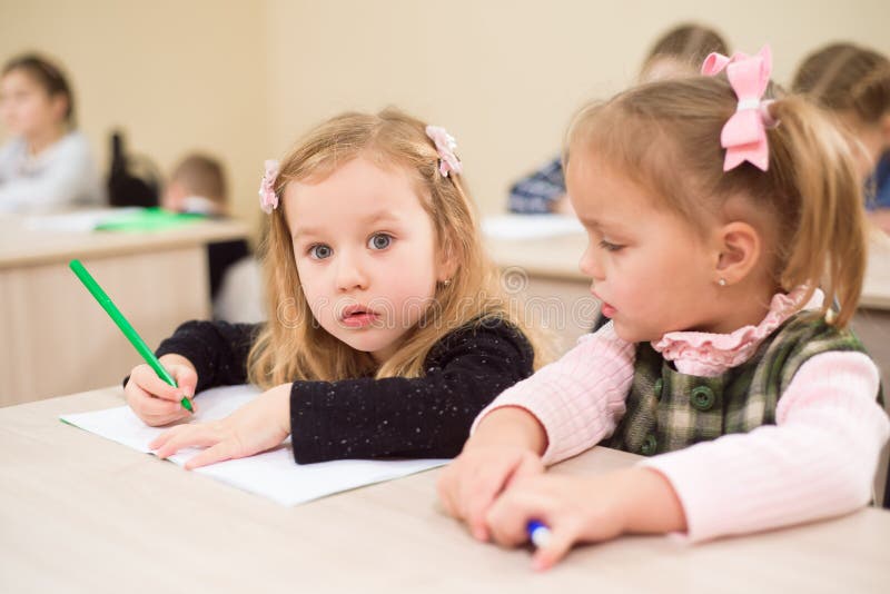 Group of Elementary Pupils in the Classroom. Stock Photo - Image of ... Group of Elementary Pupils in the Classroom. Stock Photo - Image of ...