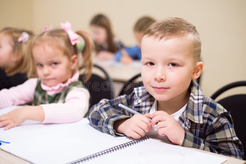 Group of Elementary Pupils in the Classroom. Stock Image - Image of ...