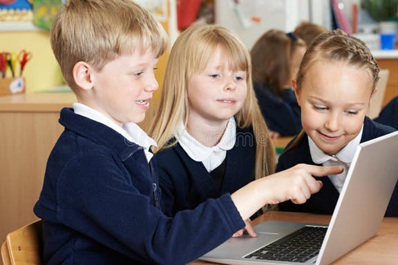 Group of Elementary School Children Working Together in Computer Stock ...