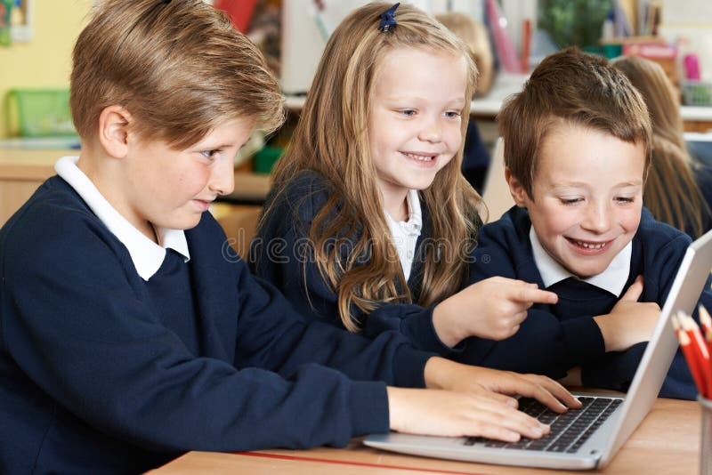 Group of Elementary School Children Working Together in Computer Stock ...